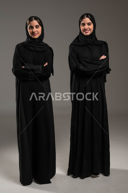 The concept of the relationship between sisters, standing straight and ...