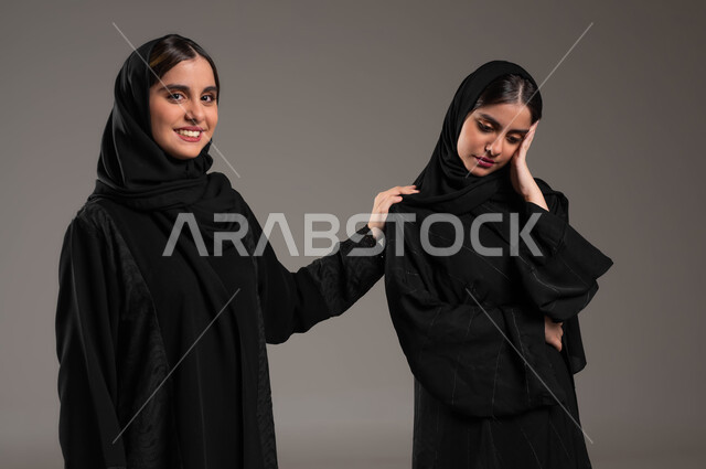 The concept of consolation between sisters, trying to help and ...