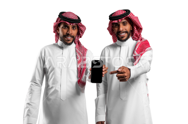 Standing and pointing at a mobile phone with a blank black screen, a ...