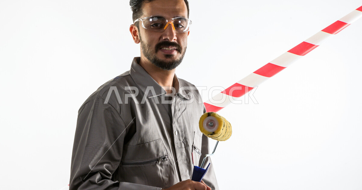 Portrait of a young Saudi Gulf man who works as a technical engineer ...
