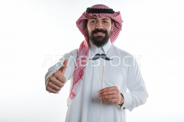Portrait of a Saudi Gulf man celebrating International Men's Day ...