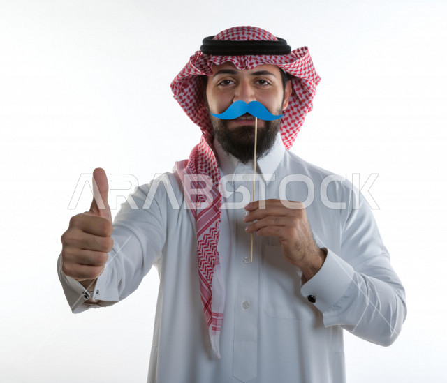 Portrait of a Saudi Gulf man celebrating International Men's Day ...