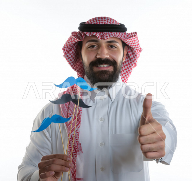 Portrait of a Saudi Gulf man celebrating International Men's Day ...