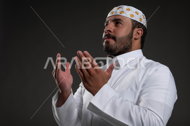 A handsome young Muslim man, supplication and supplication to the Lord ...