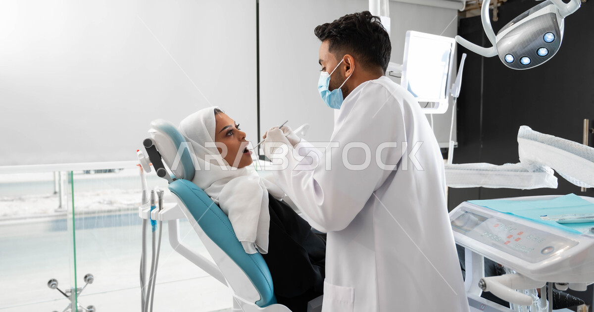 Oral and dental surgery, a side image of a Saudi Gulf Arab dentist ...