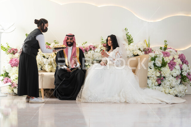 Hospitality in wedding and celebration halls, a handsome Arab groom ...