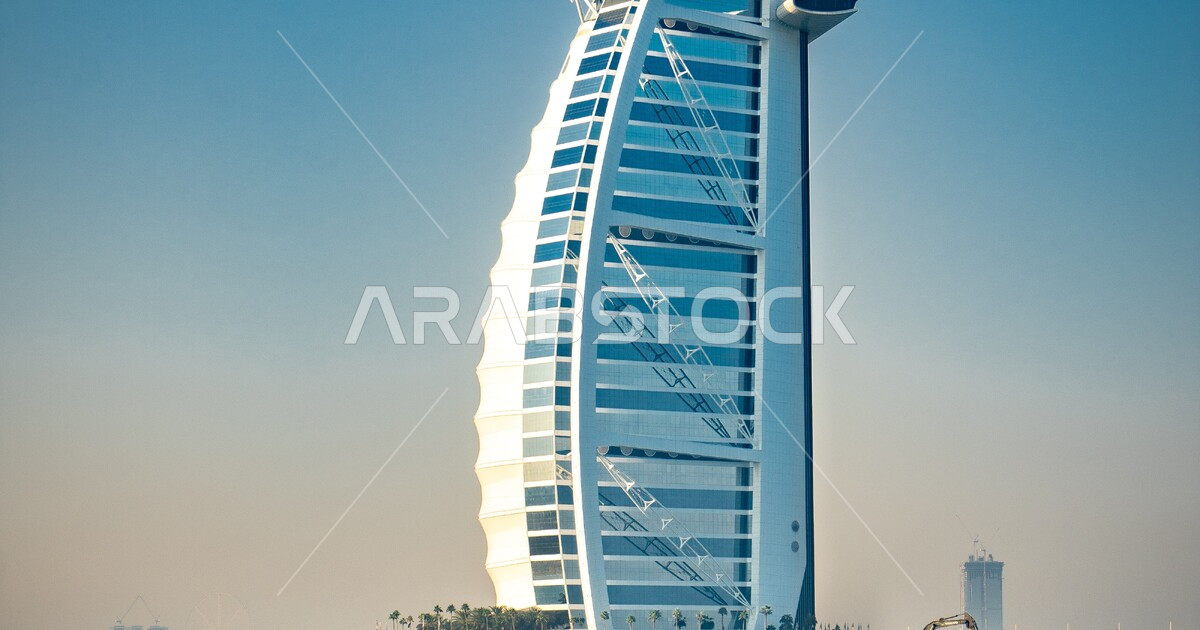The view of the clear sky at sunset, the architectural art of the Burj ...