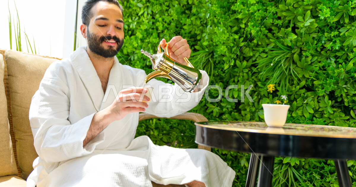 A young Saudi enjoying in one of the spa centers in Saudi Arabia, gets ...