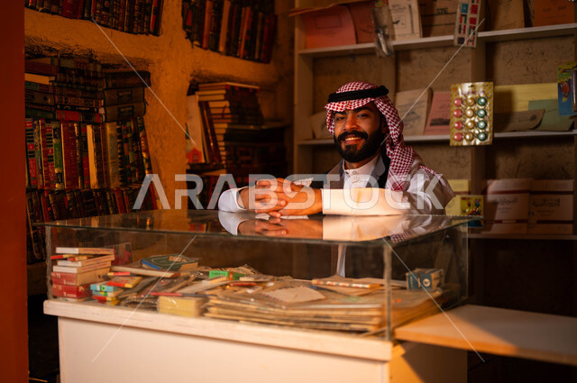 Old libraries in mud heritage neighborhoods, looking at the camera with ...