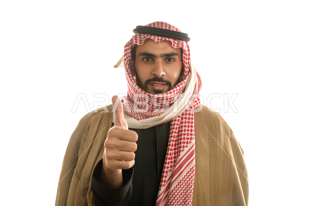Portrait of a Saudi Arabian Gulf man with different hand and face ...