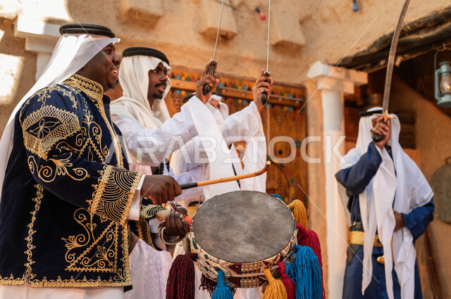 Folk dancing, chants, and drumming on national occasions, a Saudi Gulf ...