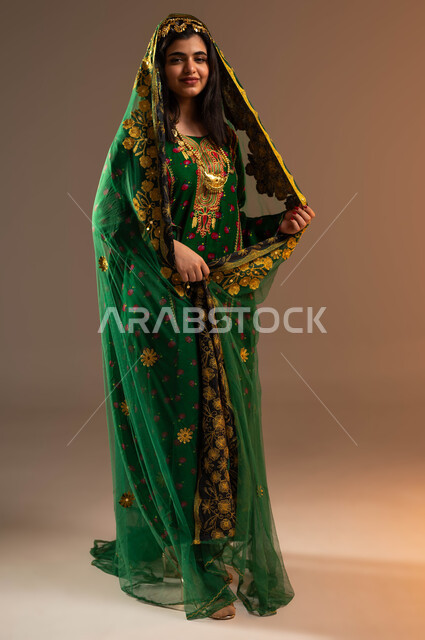 Showing feelings of belonging to the state, portrait of a Saudi Gulf ...