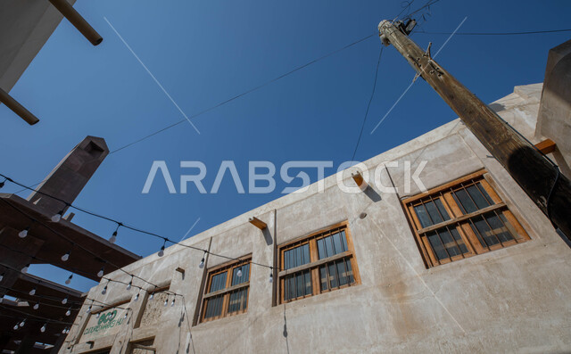Old wooden windows in the popular Muharraq market in the Kingdom of ...