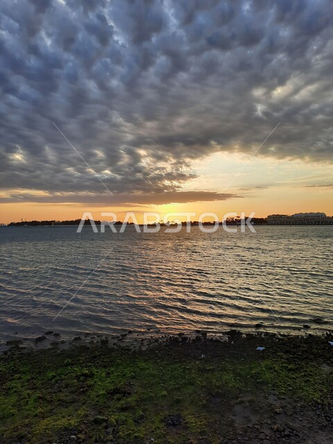 Enjoying the view of the water at sunset on Jeddah’s tourist beach ...
