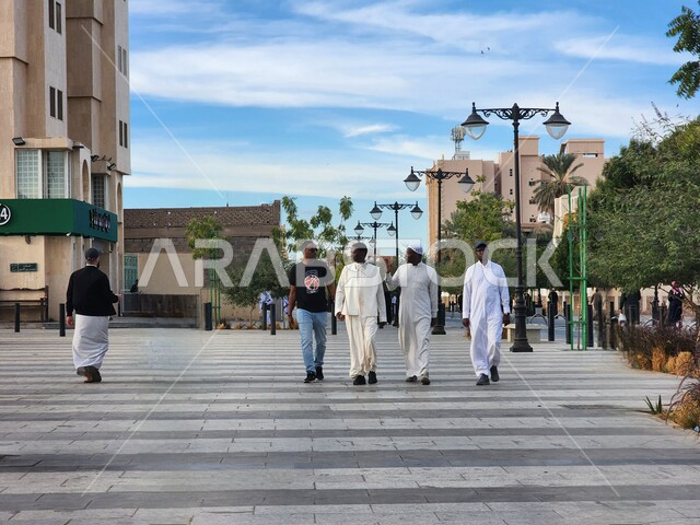 Famous Islamic religious places and landmarks, a group of men walking ...