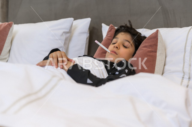 A sick Arab child suffers from fatigue and pain, receives care and ...