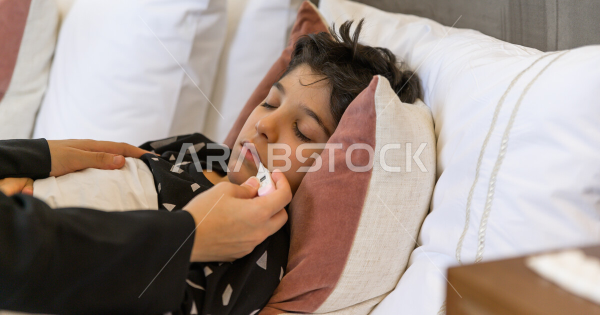 A sick Arab child suffers from fatigue and pain, receives care and ...