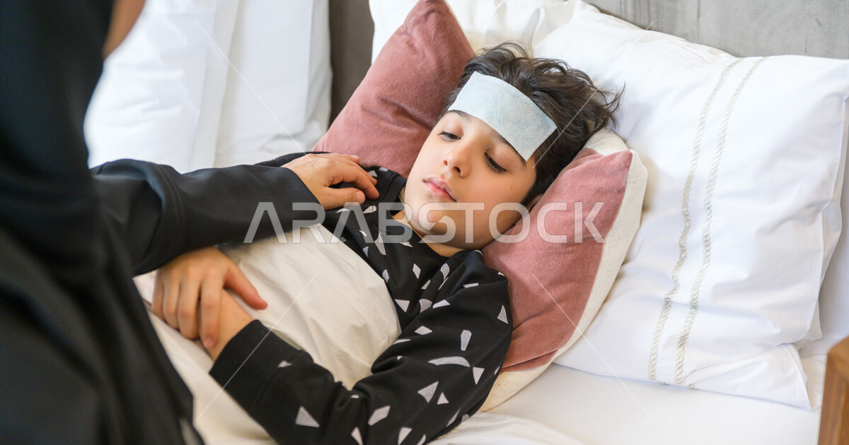 A sick Arab child suffers from fatigue and pain, receives care and ...