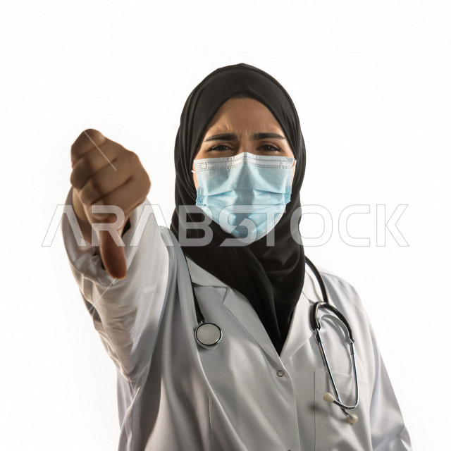 Portrait of a Saudi Gulf doctor wearing a muzzle, providing health care ...