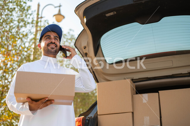 Effective communication with customers, a smiling Saudi Arabian Gulf ...