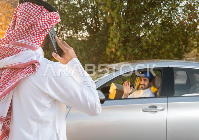 The moment the delivery vehicle arrives, a picture from the back of a ...