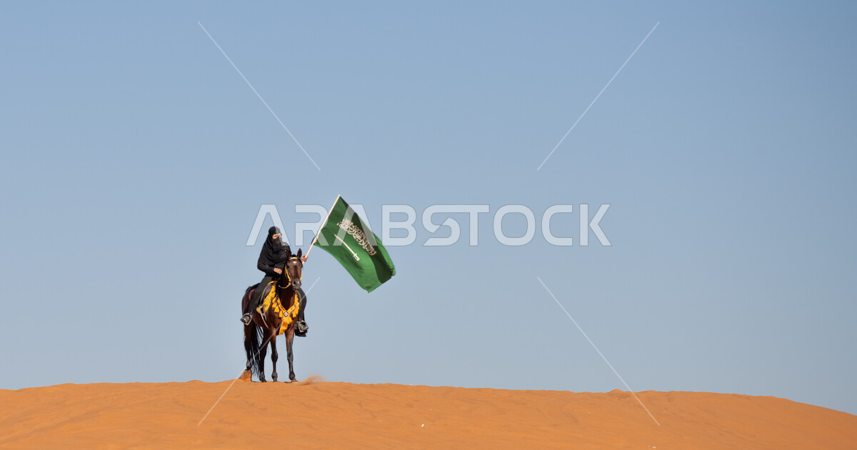Raising the flag of the Kingdom with pride and honor on National Day on ...