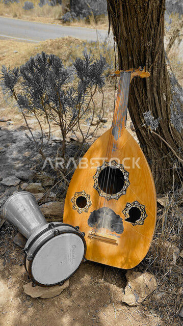 Using percussive musical instruments, a close-up of a Gulf drum and an ...