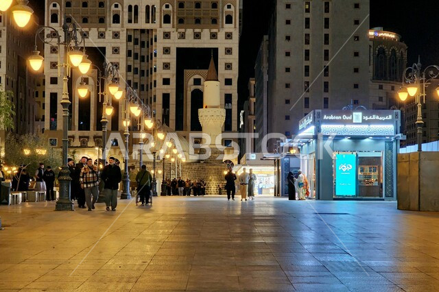 Paved streets and roads, the domes and minarets of Al-Ghumama Mosque on ...
