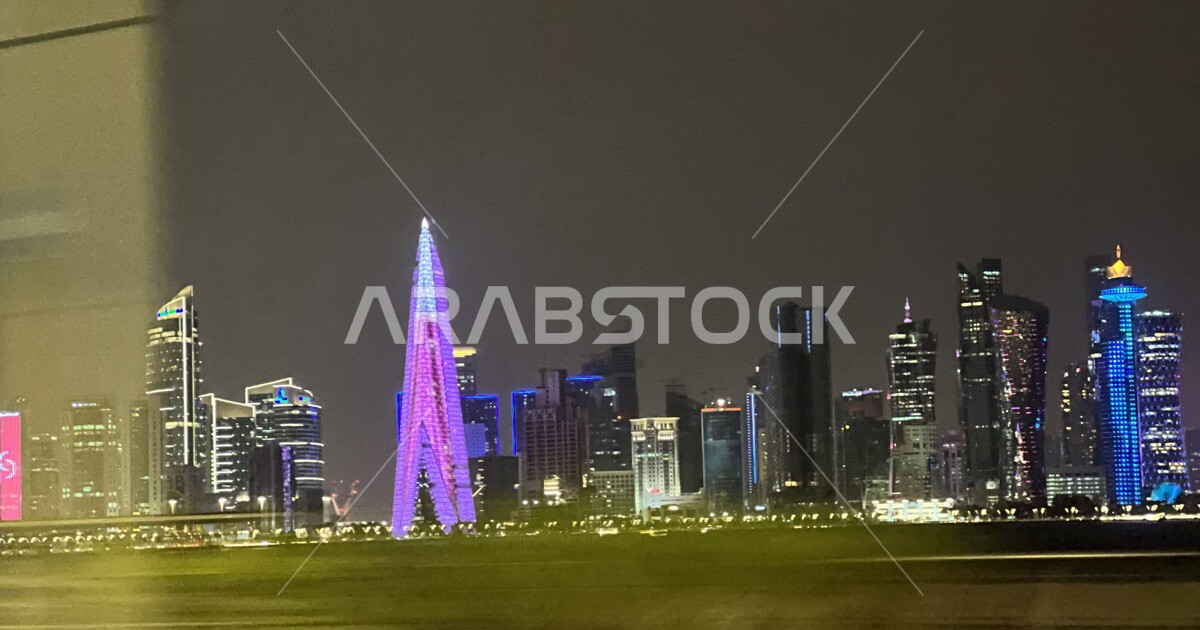 Modern architectural art, towers and skyscrapers in Doha at night ...