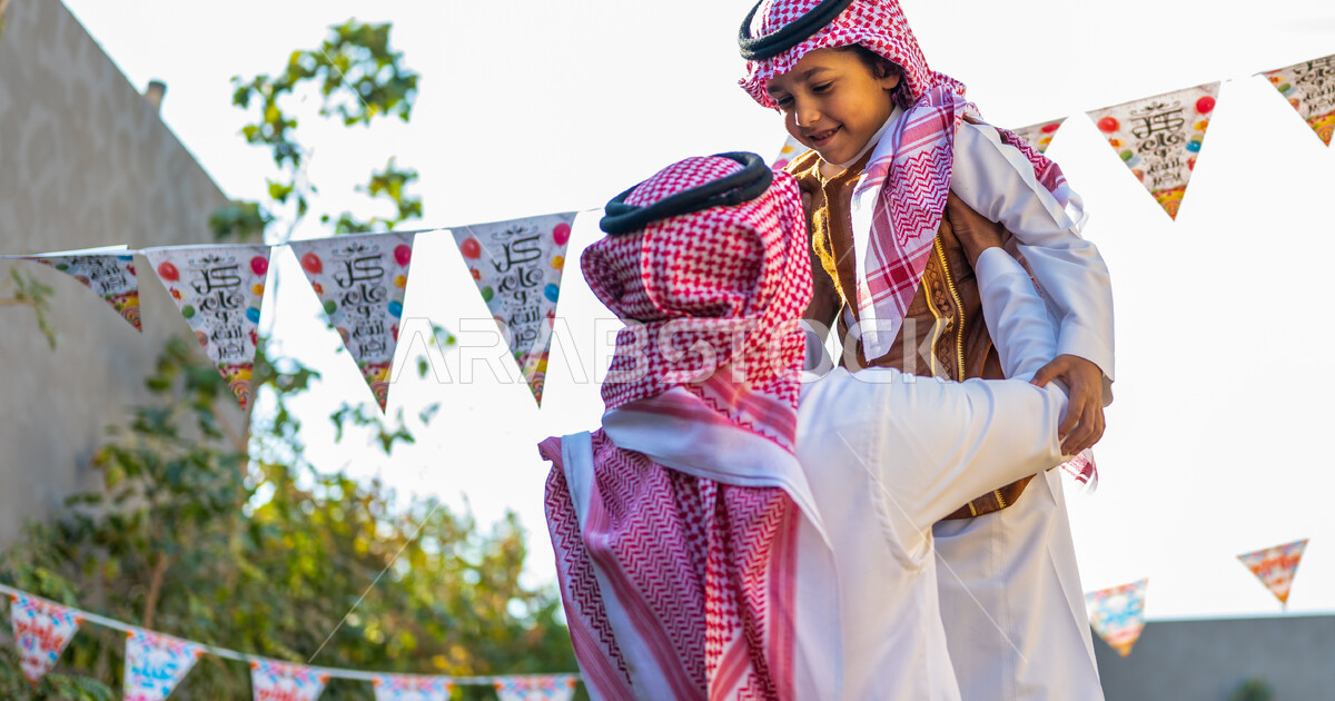 Holiday decorations in chalets, Eid atmosphere in Saudi Arab society, a ...