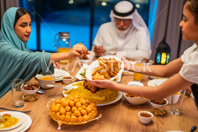 Sharing food and honoring parents, a religious Ramadan atmosphere, a ...