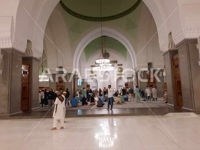 A group of worshipers inside the Quba Mosque in Medina, Saudi Arabia ...