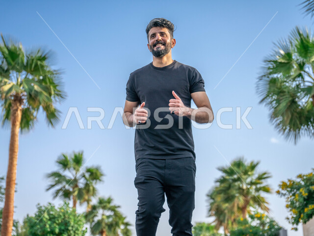 Gestures of happiness and pleasure, green plants and trees, walking in ...