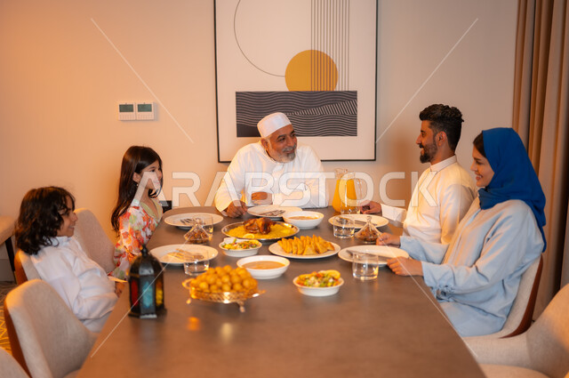 A happy Ramadan religious family atmosphere, a Saudi Gulf Arab family ...