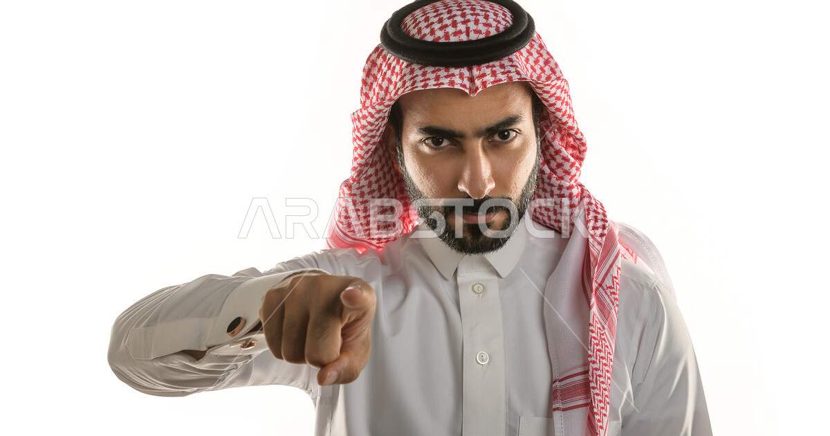 Portrait of a Saudi Gulf man angry and frowning with different face and ...