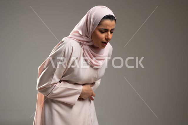 Gestures of vomiting and nausea, a feeling of colic and pain, a feeling ...