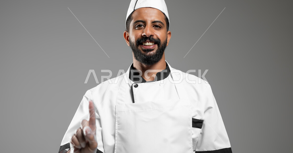 Expressions of the number one, a Saudi Arabian Gulf chef wearing a ...