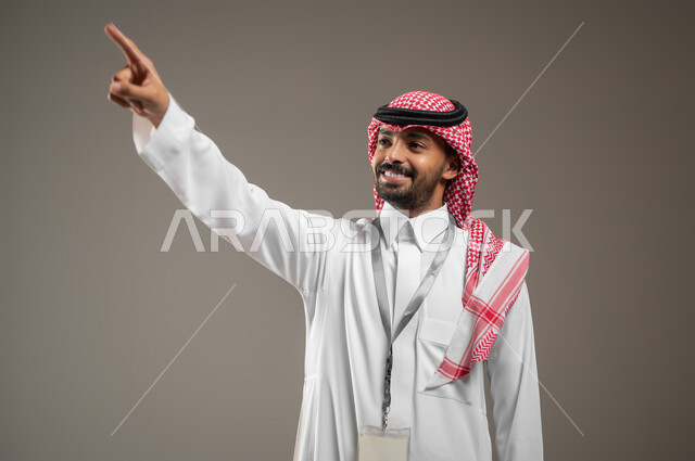 A close-up portrait of a Saudi Arabian Gulf man in Saudi uniform ...
