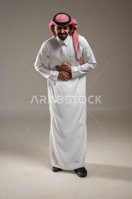 Portrait of a Saudi Arabian Gulf man wearing a Saudi uniform, facial ...