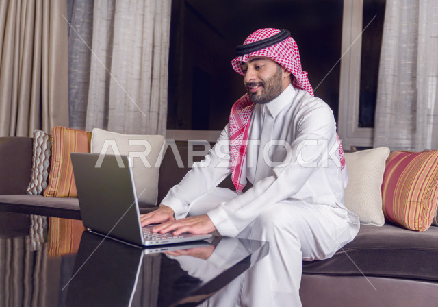 A Saudi Arabian Gulf man travels for work and goes down to a hotel, a ...