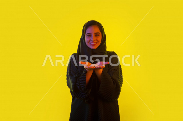 Portrait of a happy Saudi Arabian Gulf woman with different face and ...