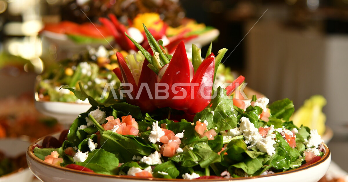 A plate of fresh vegetable salad decorated with cheese, delicious ...