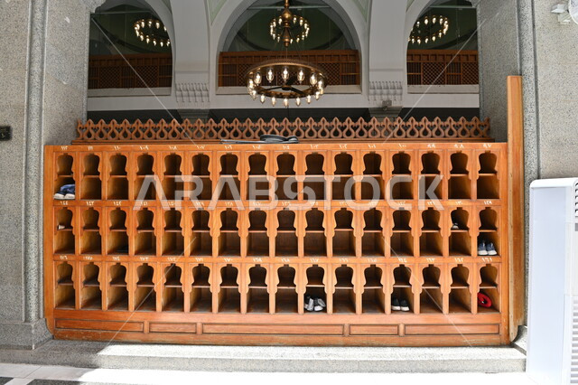 A numbered wooden cabinet for storing shoes in the Quba Mosque in ...