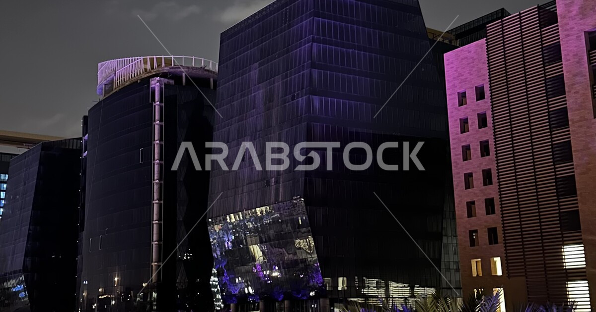 Residential and commercial towers and skyscrapers at night in the city ...