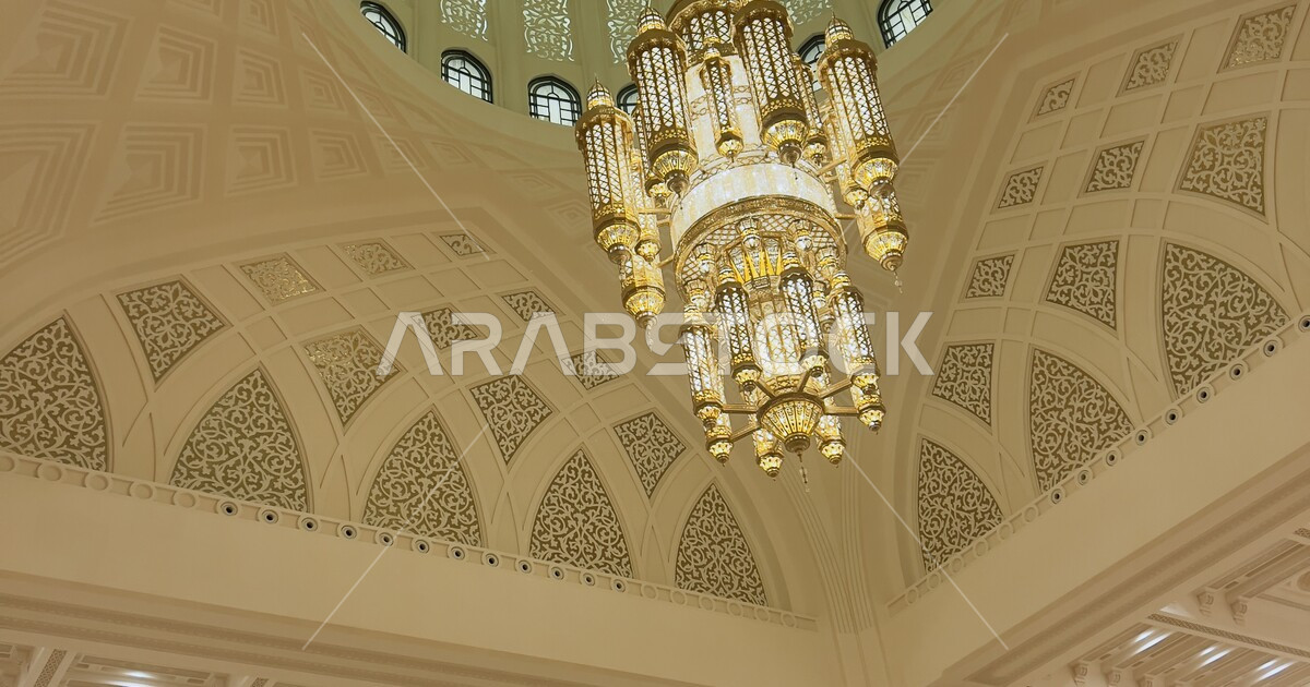 Large, luxurious decorations and chandeliers hanging from the ceiling ...
