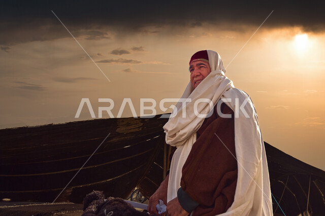 Wild Kashta and popular Arab winter atmosphere, a Saudi Gulf Arab man ...