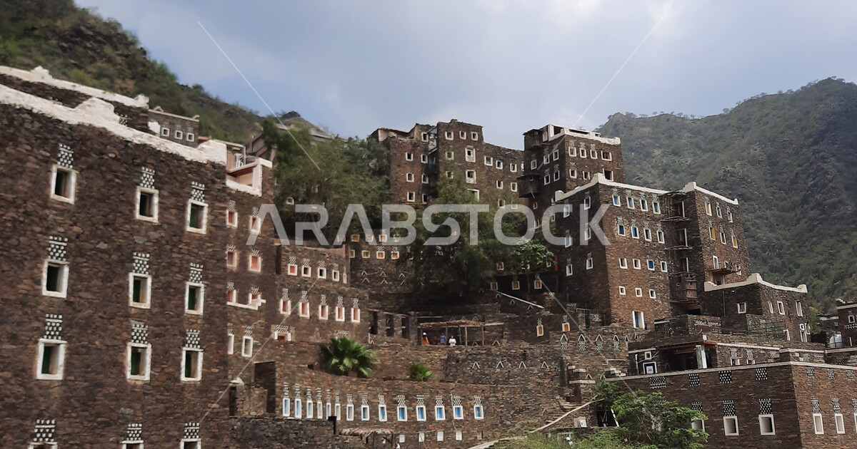 Stone buildings with wooden windows, the architectural art of old-style ...