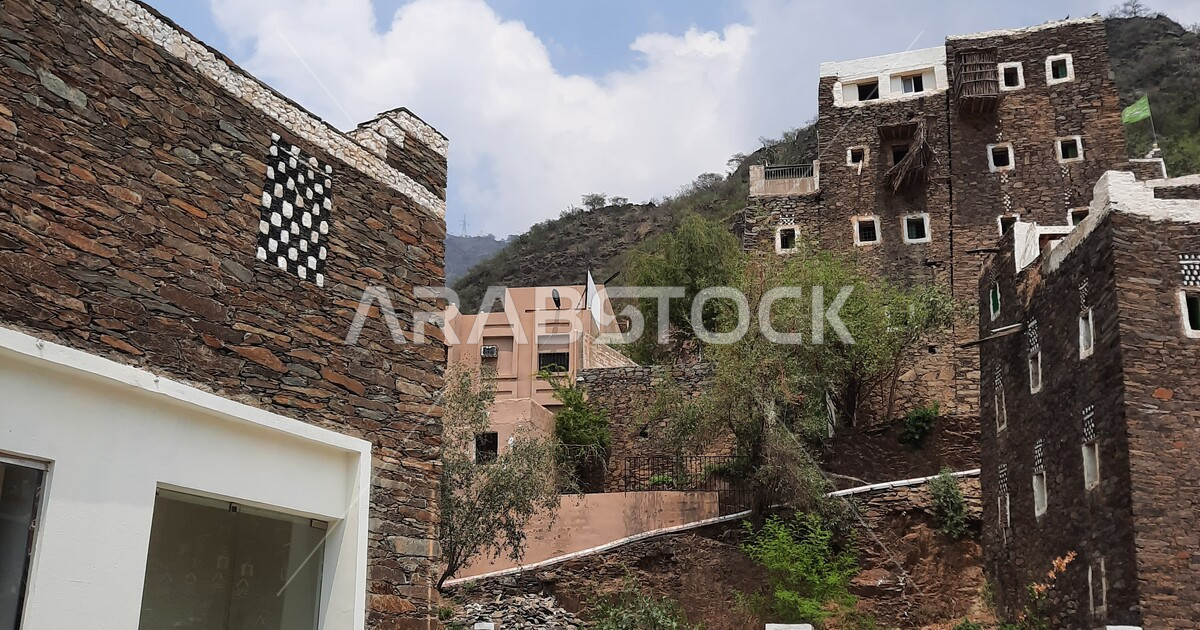 Stone buildings with wooden windows, the architectural art of old-style ...