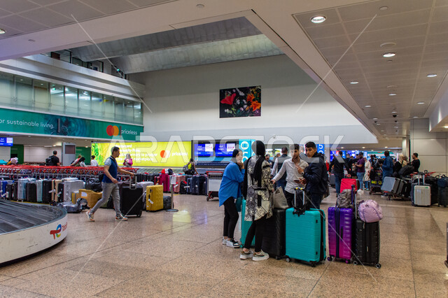 Travelers standing in the passenger reception halls, the interior ...