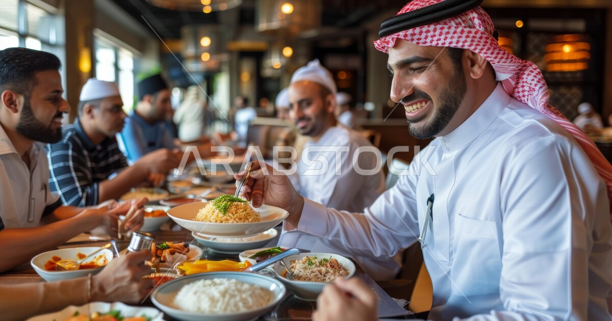 A luncheon party for Saudi Arab Gulf businessmen wearing traditional ...